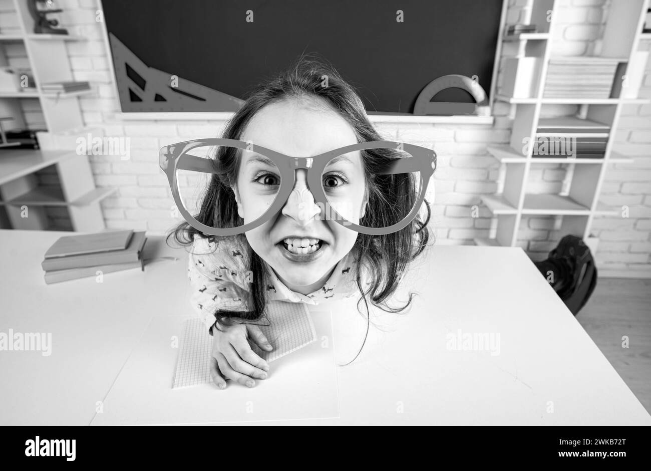 Angry school kid in class Black and White Stock Photos & Images - Alamy