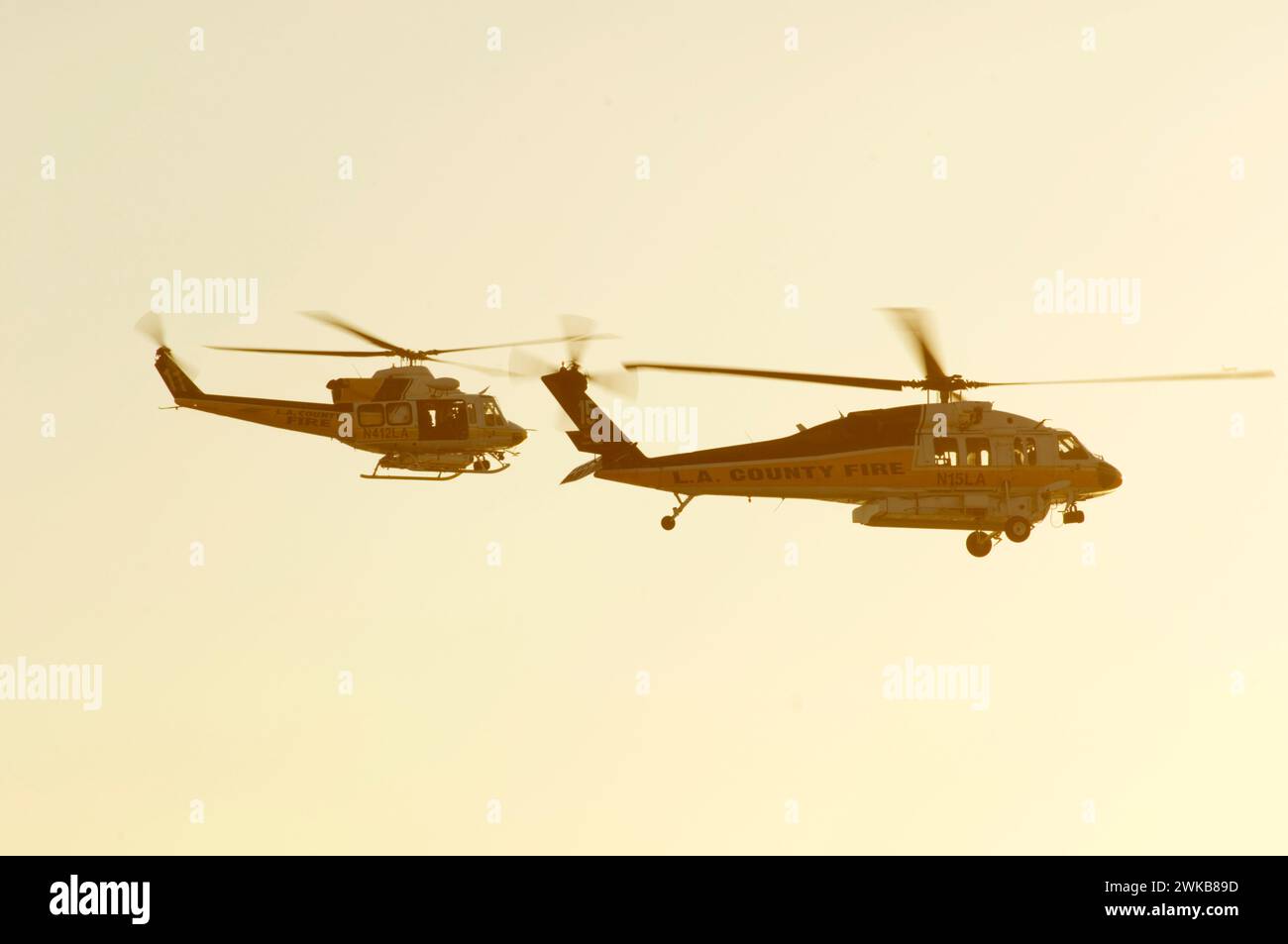 L,A. County Fire Department helicopters responding to a call fly aliong ...