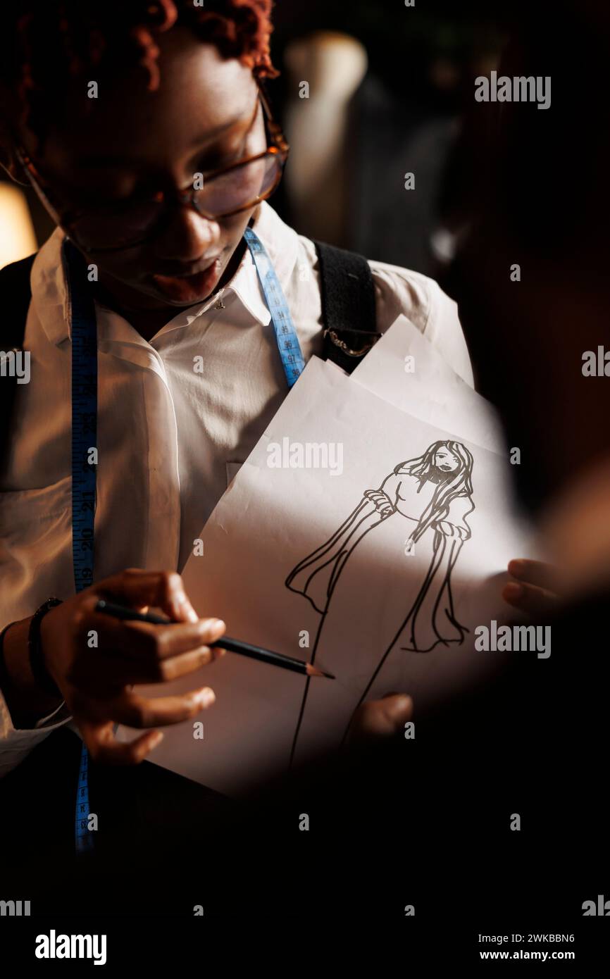 African american dressmaker designing bespoke sartorial collection for ...