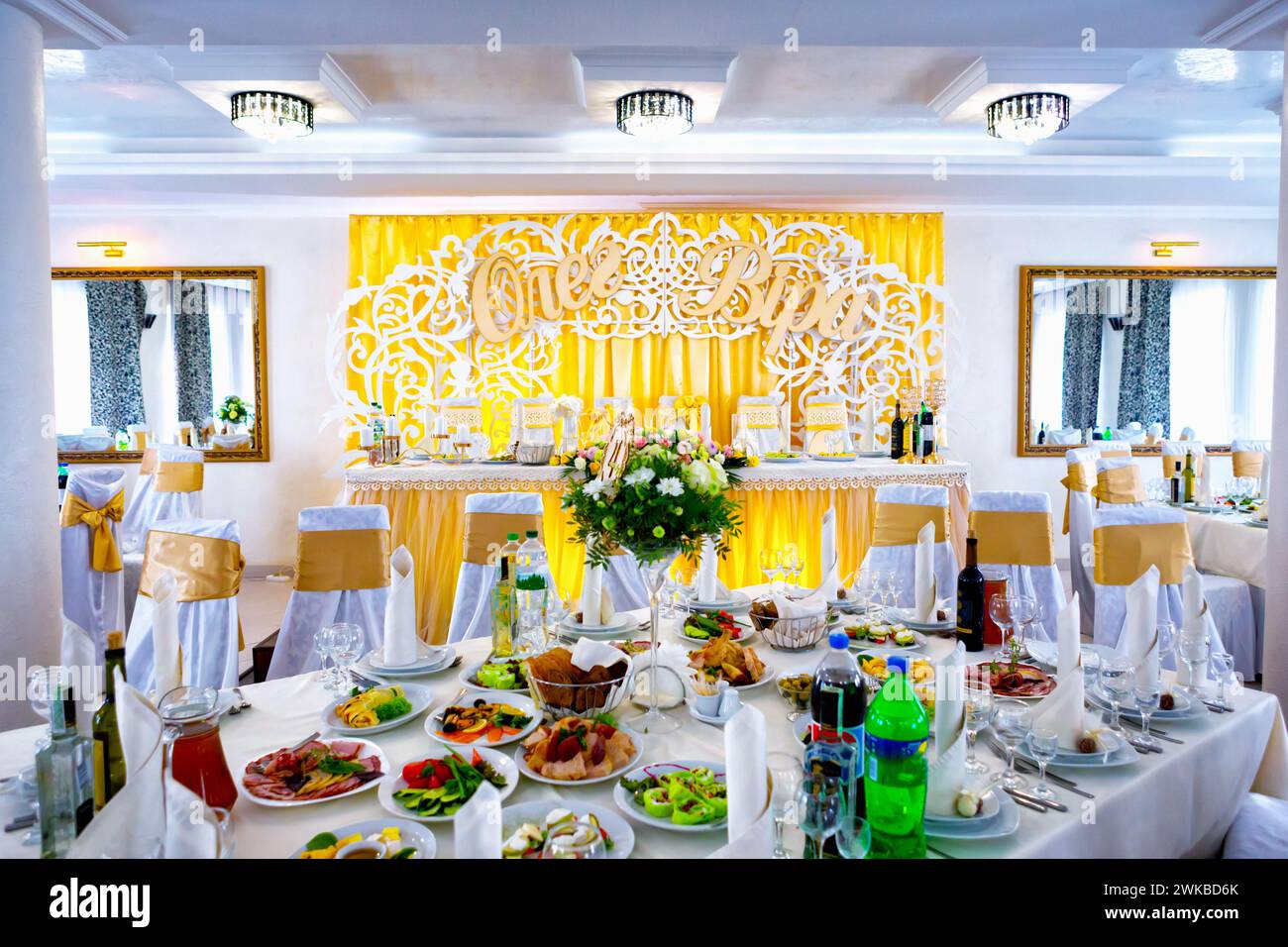 Wedding reception chairs tables hall hi-res stock photography and ...