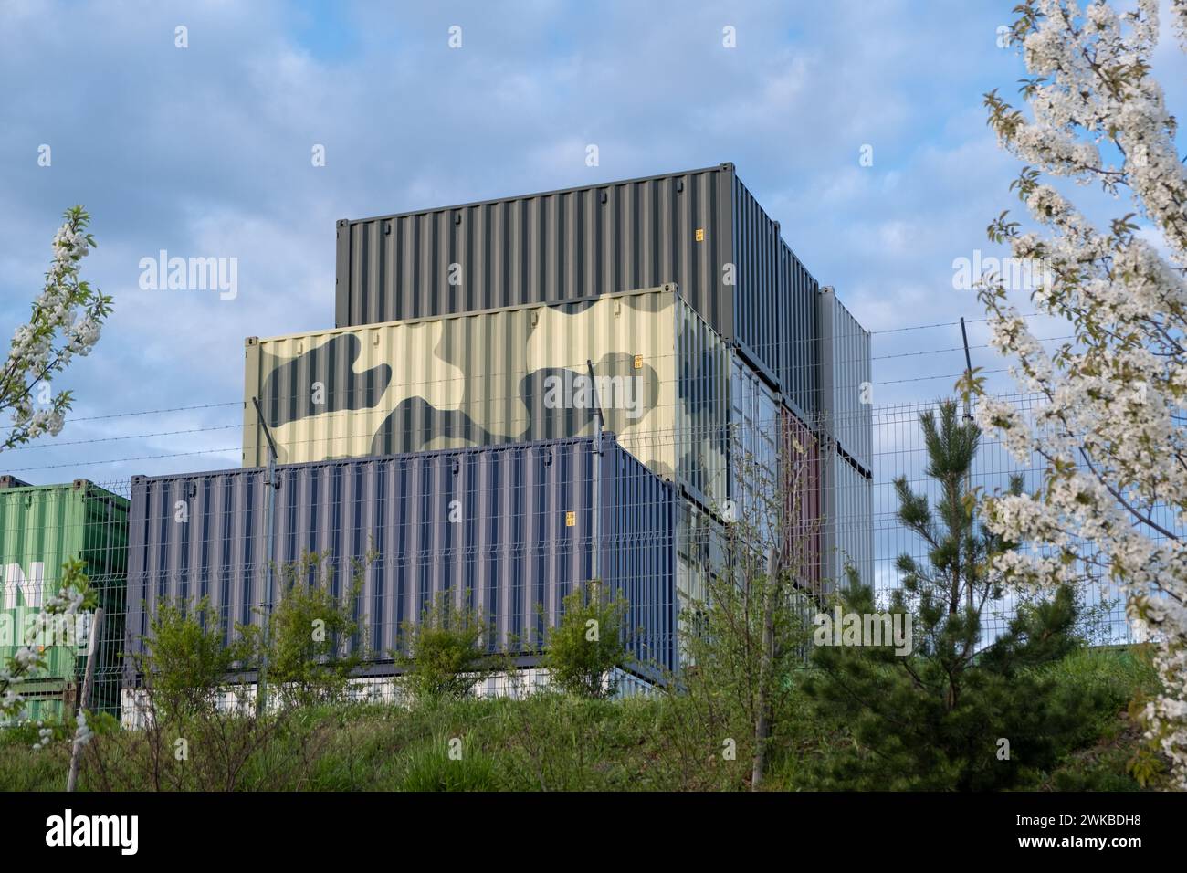 Military shipping containers contain weapon or special-purpose. stacked ...