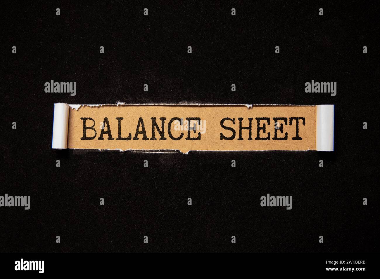 Balance Sheet. text on an open notebook on an envelope with money Stock ...