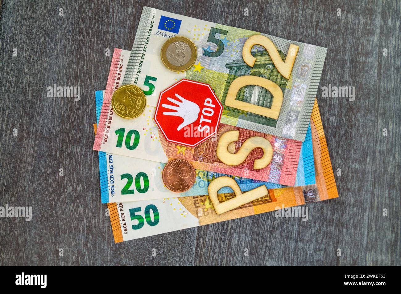lettering 'PSD2', Euro coins and stop sign on Euro bills Stock Photo ...