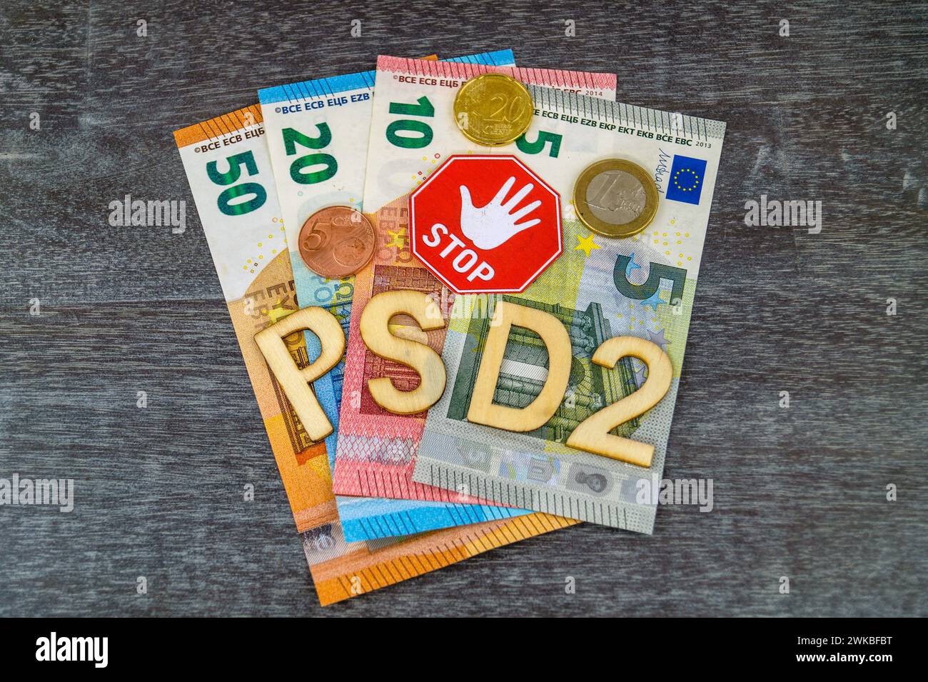 lettering 'PSD2', Euro coins and stop sign on Euro bills Stock Photo ...