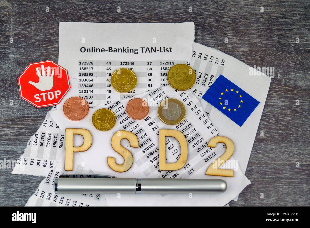 lettering 'PSD2', fountain pen, Euro coins, European flag and stop sign ...