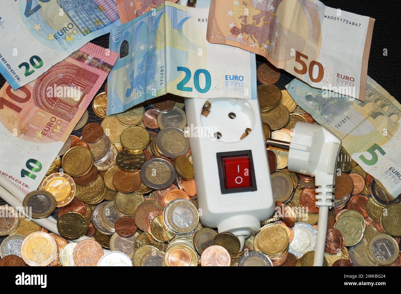 outlet strip and money, symbolic image of electricity costs Stock Photo ...