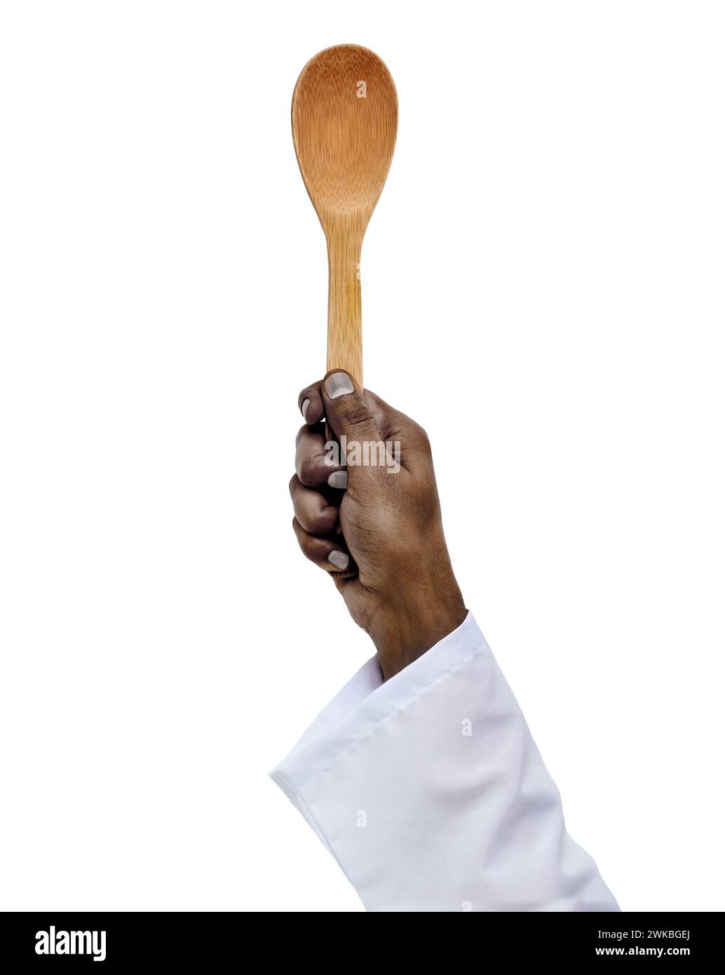 A chef arm holding wood spoon with white background Stock Photo - Alamy