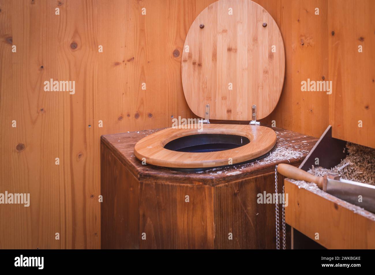 Wooden ecological composting toilet with sawdust Stock Photo - Alamy
