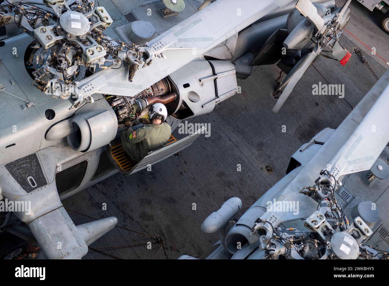 240215-N-NT409-1013 ATLANTIC OCEAN, (Feb. 15, 2024) A pilot works a MH ...