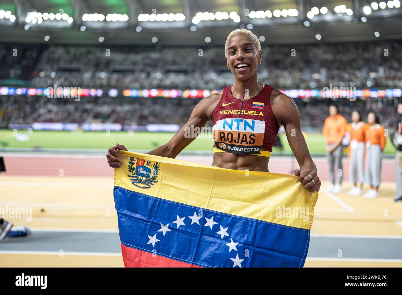 Yulimar ROJAS celebrating his medal with the flag in the Budapest 2023 ...
