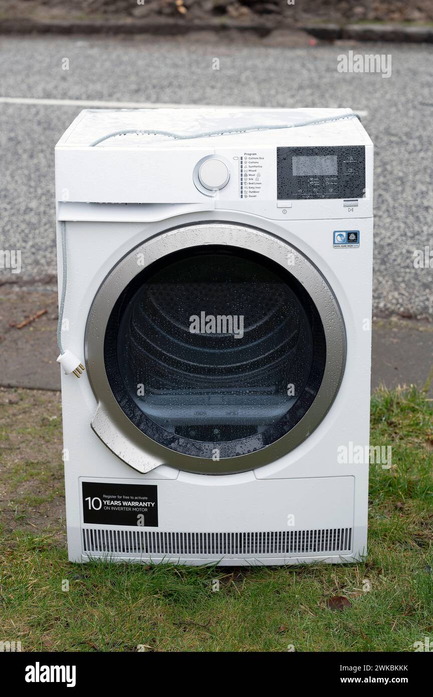 Washing machine outside on a rainy day Stock Photo - Alamy