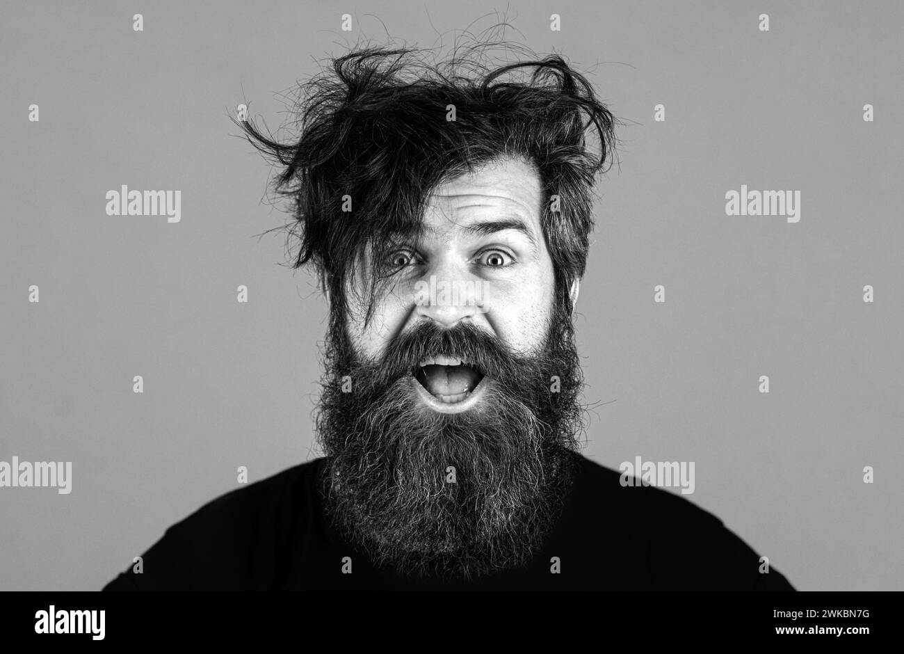 Surprised handsome man. Shocked male model with surprise expression ...