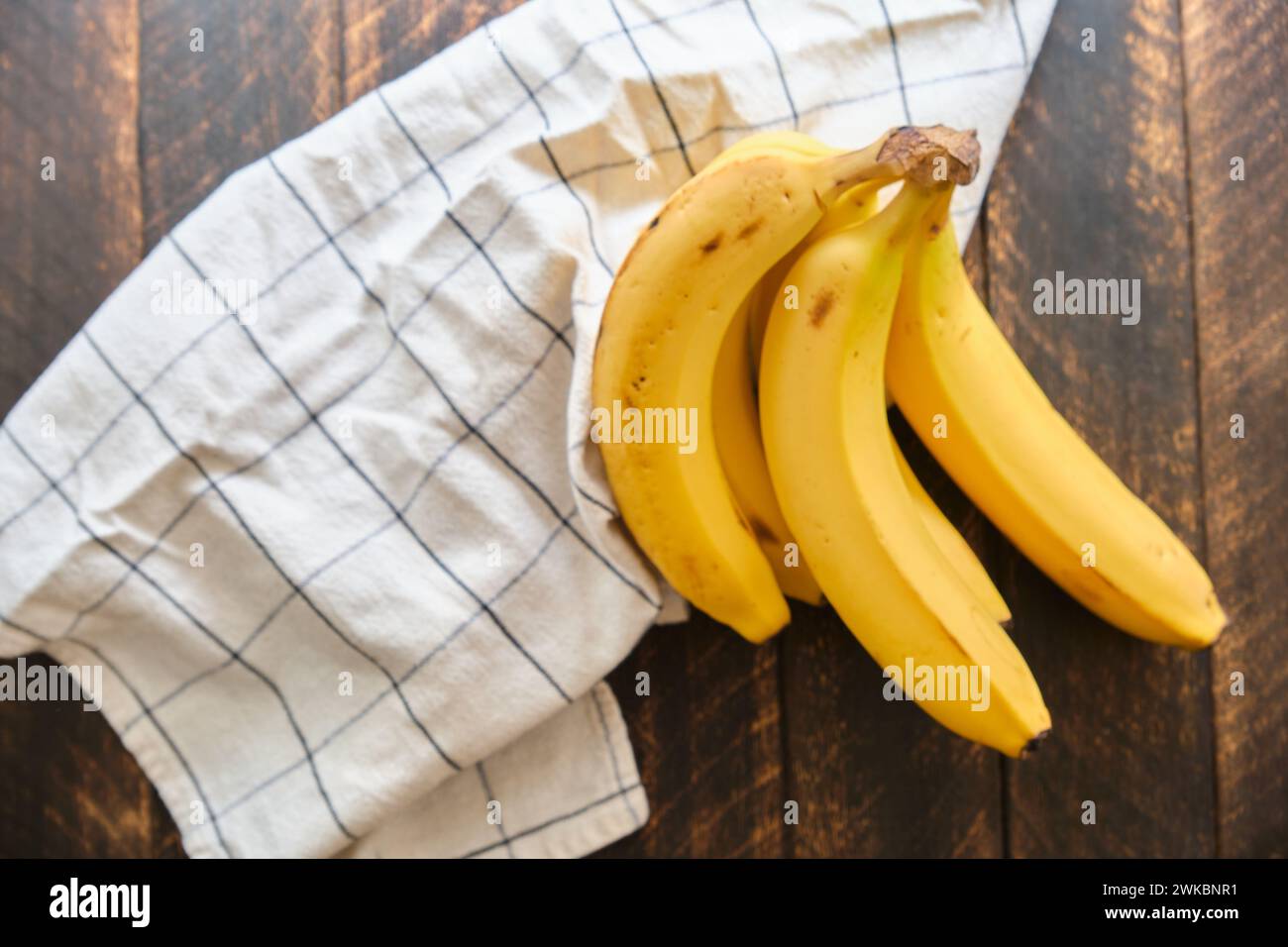 Delicious bananas on table in kitchen, decorative kitchen interior ...