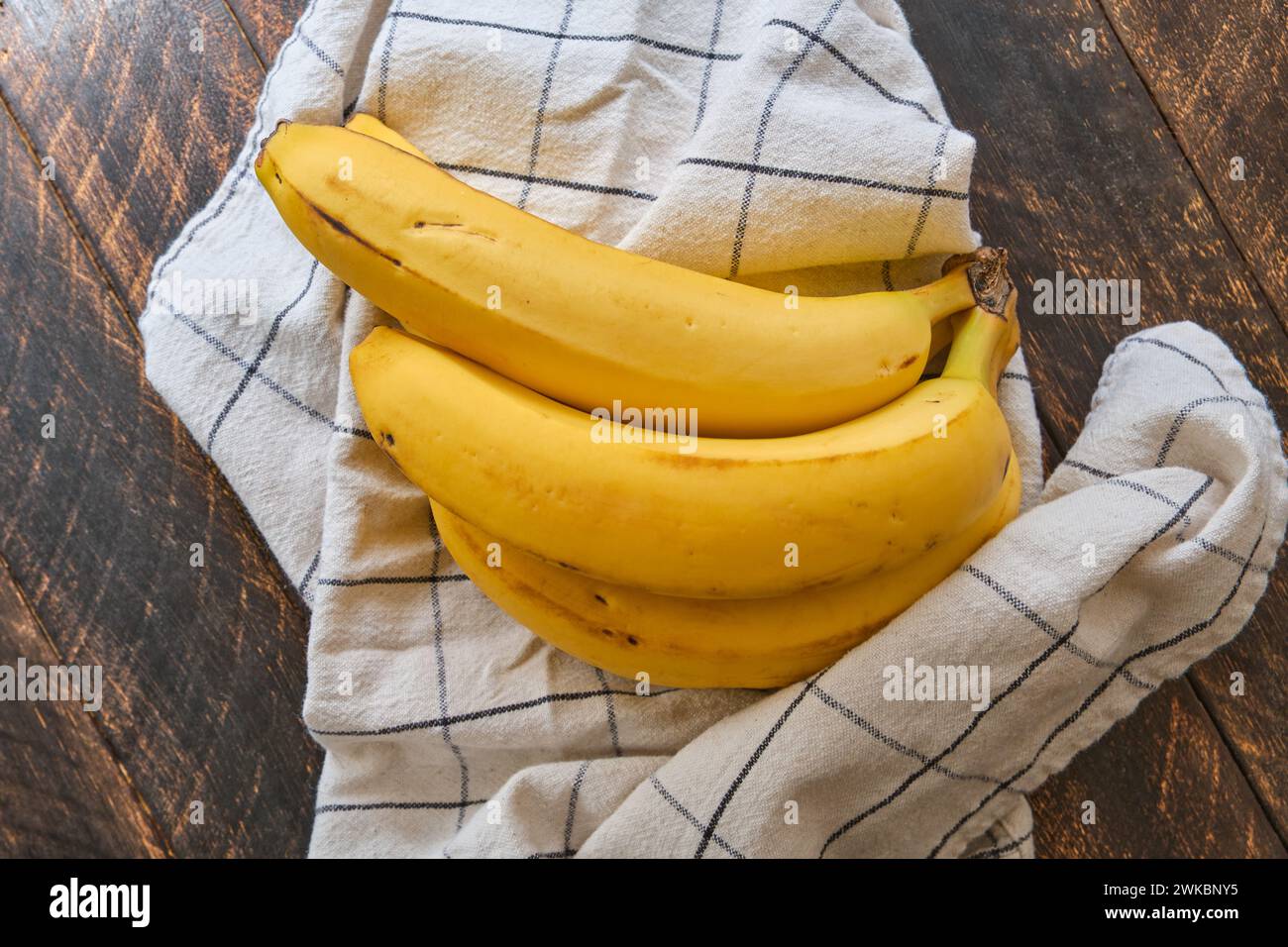 Delicious bananas on table in kitchen, decorative kitchen interior ...