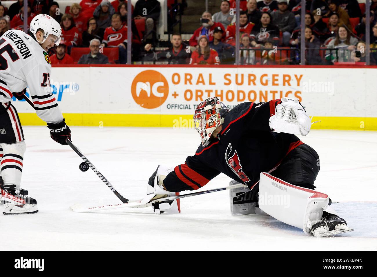 Carolina Hurricanes goaltender Spencer Martin (41) poke checks the puck ...