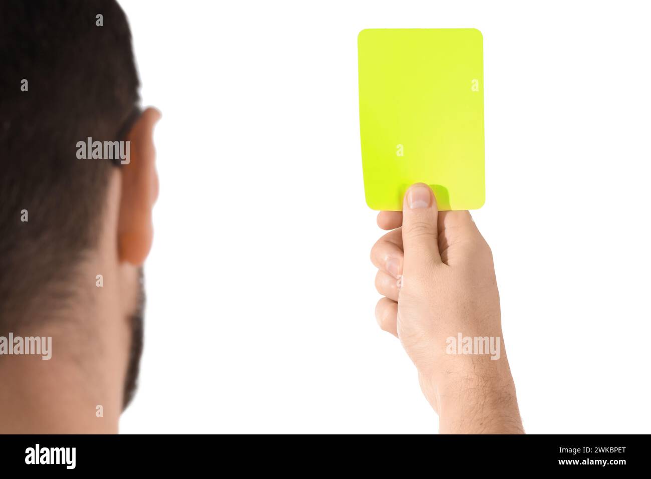 Referee holding yellow card on white background, closeup Stock Photo ...