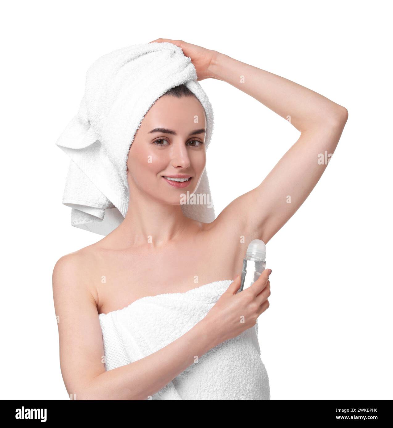 Beautiful woman applying deodorant on white background Stock Photo - Alamy