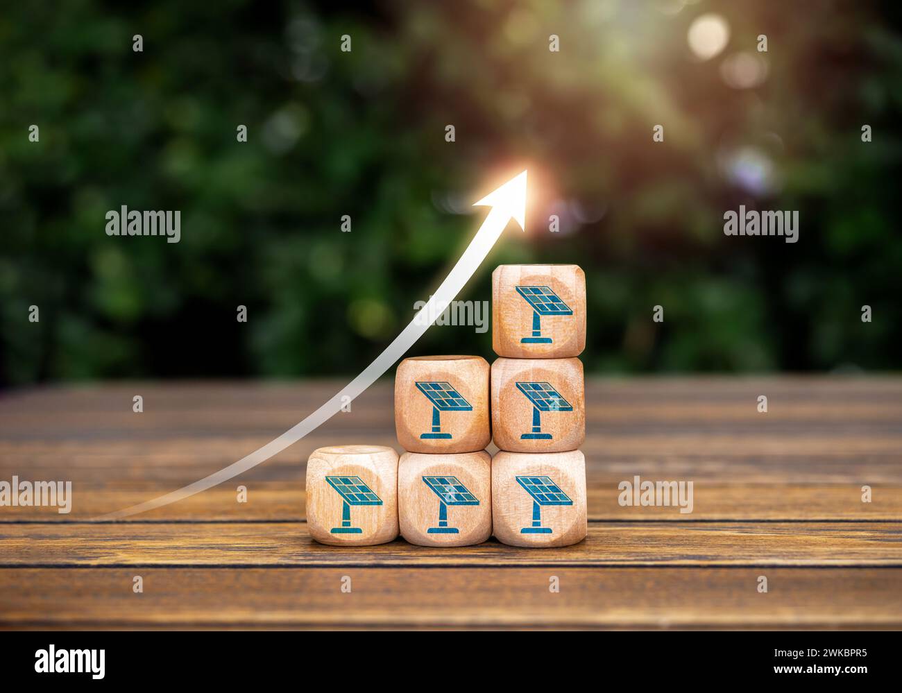 Rising up arrows on wooden cube blocks stack as business graph steps ...