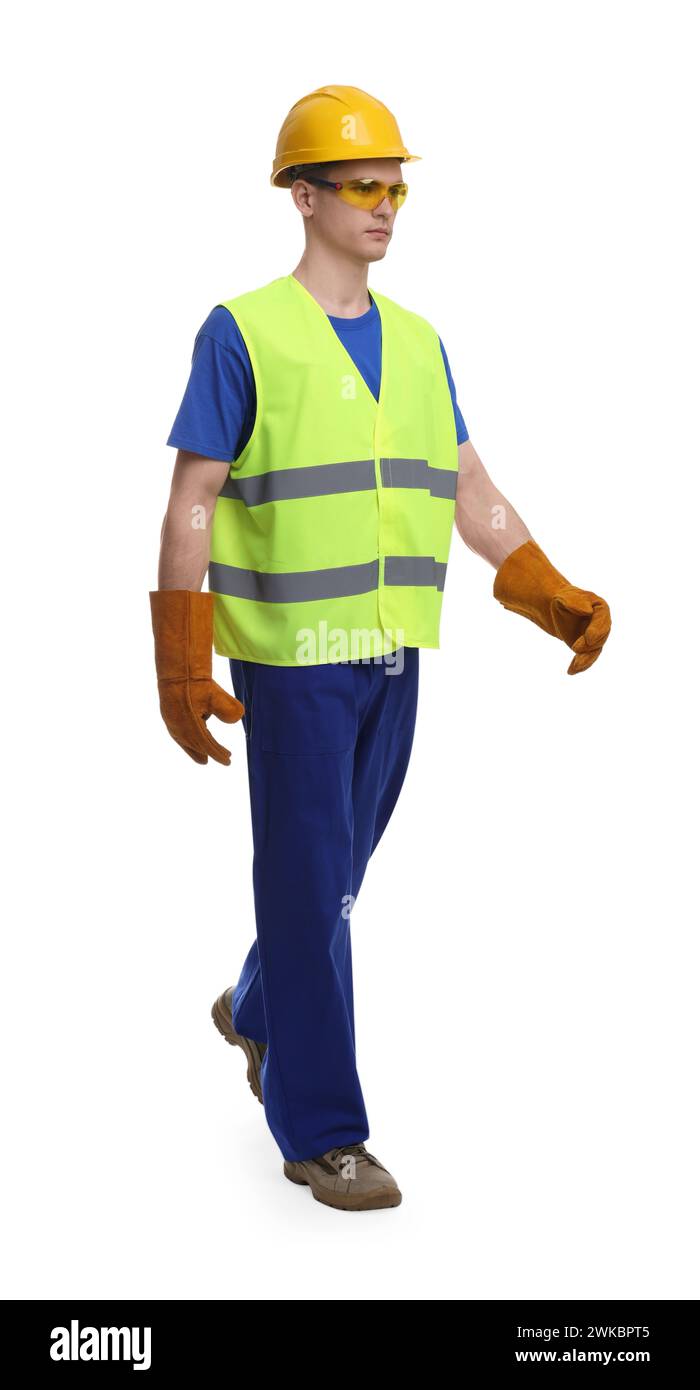 Young man wearing safety equipment on white background Stock Photo - Alamy