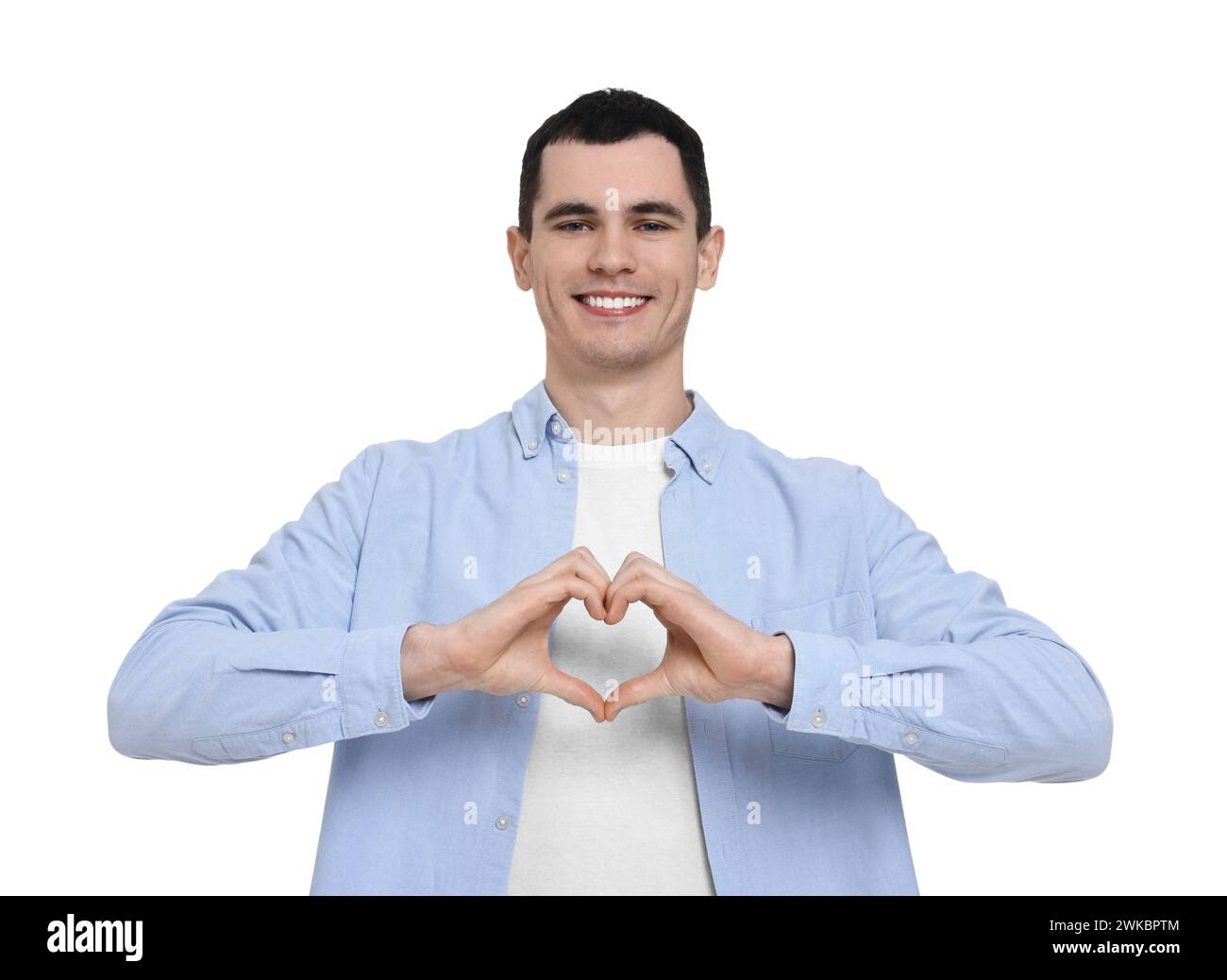 Man showing heart gesture with hands on white background Stock Photo ...