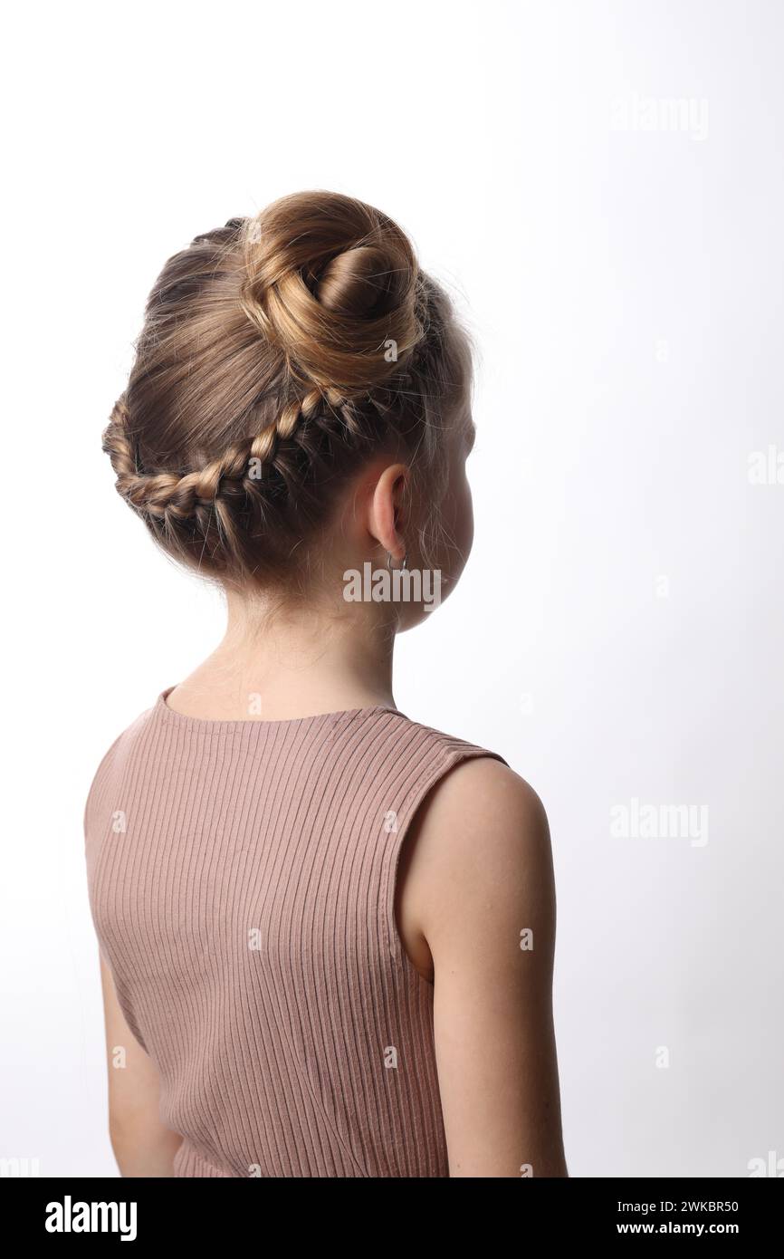 Little girl with braided hair on white background, back view Stock ...