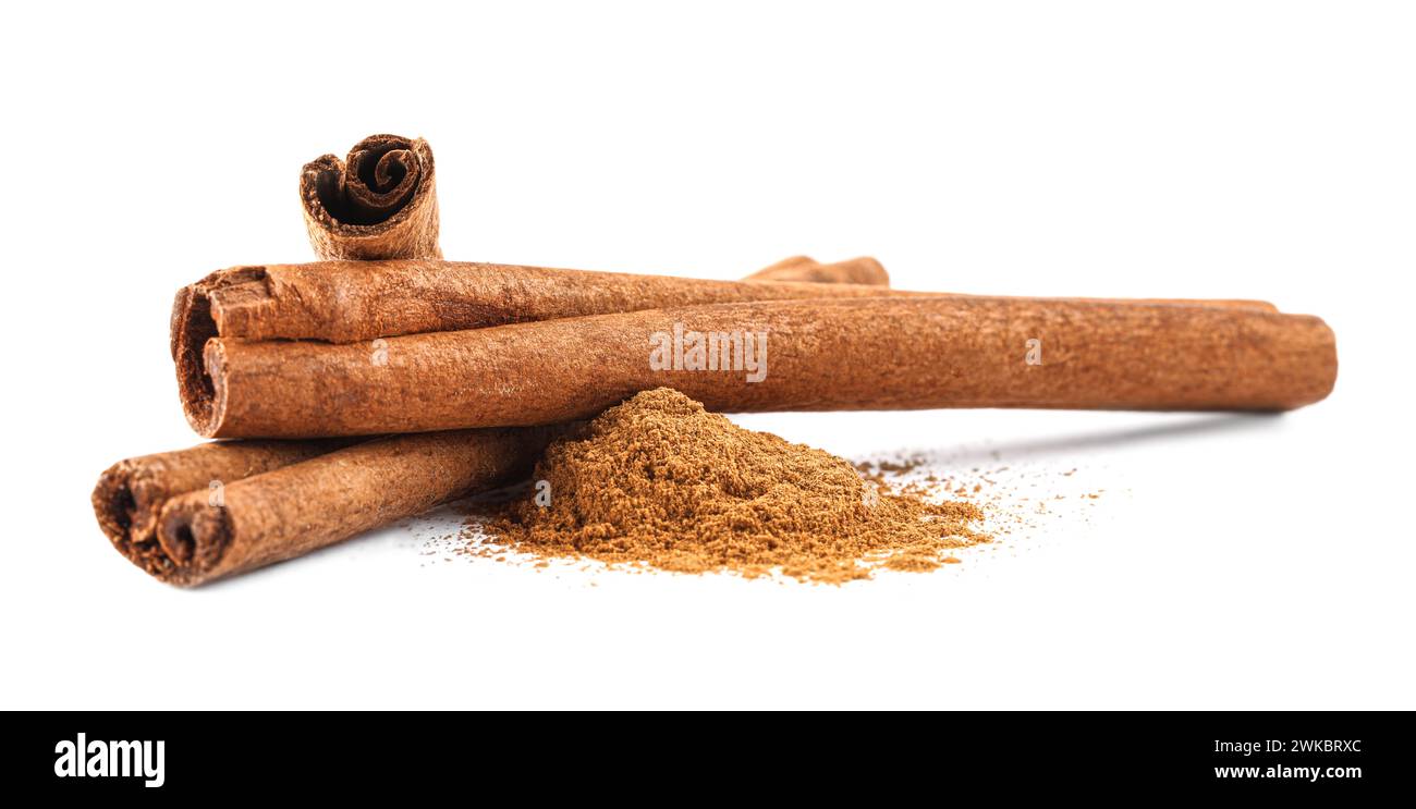 Dry aromatic cinnamon sticks and powder isolated on white Stock Photo ...