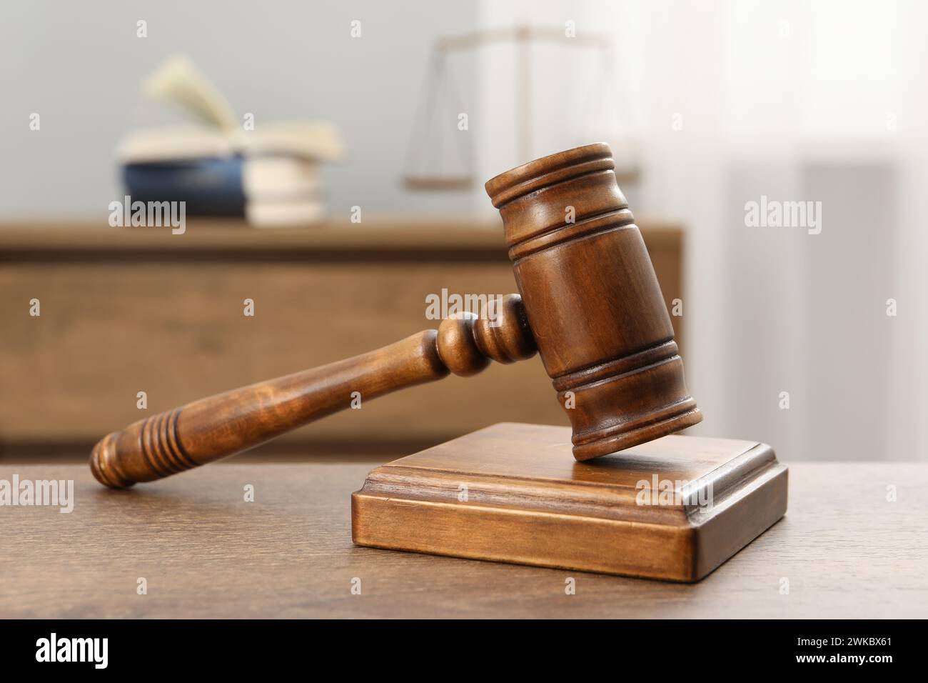 Wooden gavel and sound block on table indoors, closeup Stock Photo - Alamy