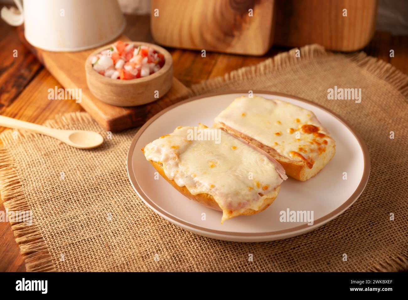 Molletes. Mexican recipe based on bolillo bread split lengthwise ...