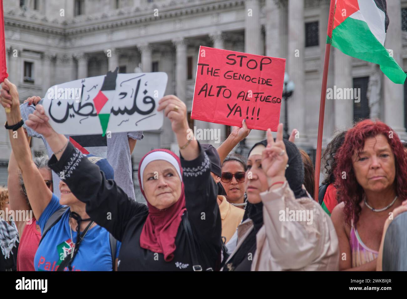Buenos Aires, Argentina, Feb 16, 2024: Women raising Palestinian flags ...