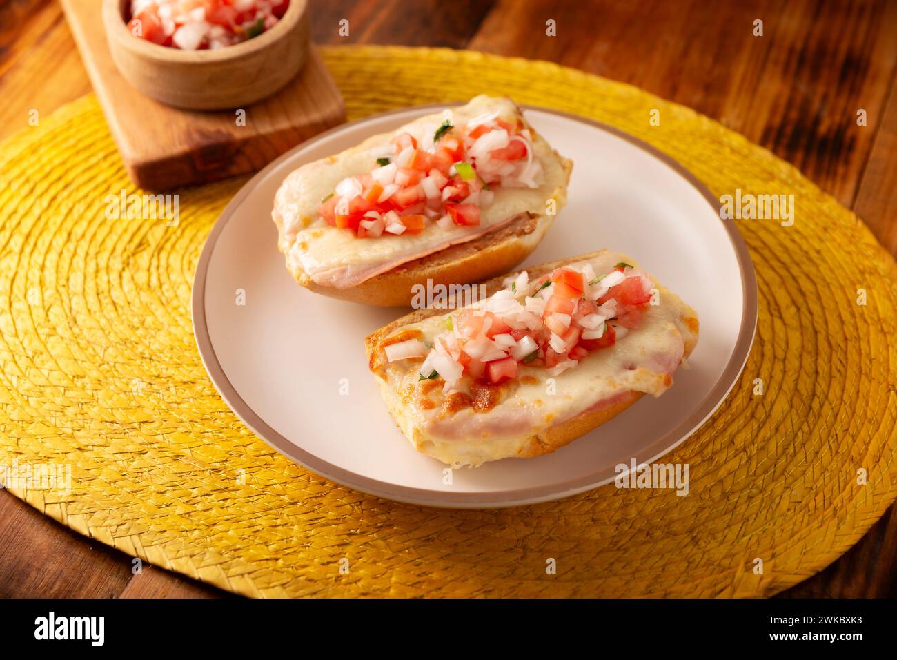 Molletes. Mexican recipe based on bolillo bread split lengthwise ...