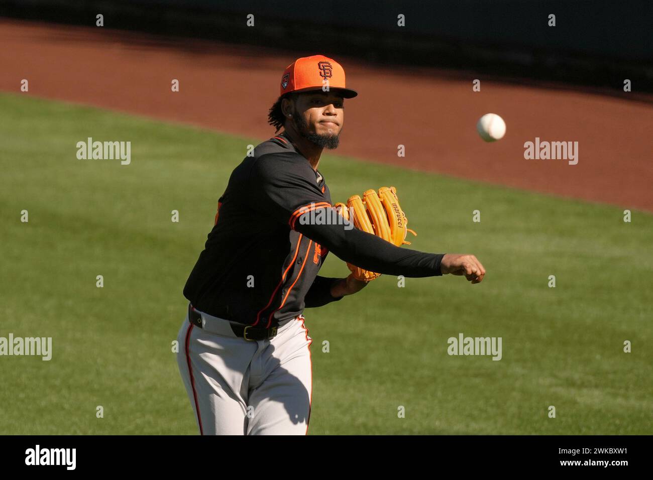 San Francisco Giants relief pitcher Camilo Doval warms up during spring training baseball ...