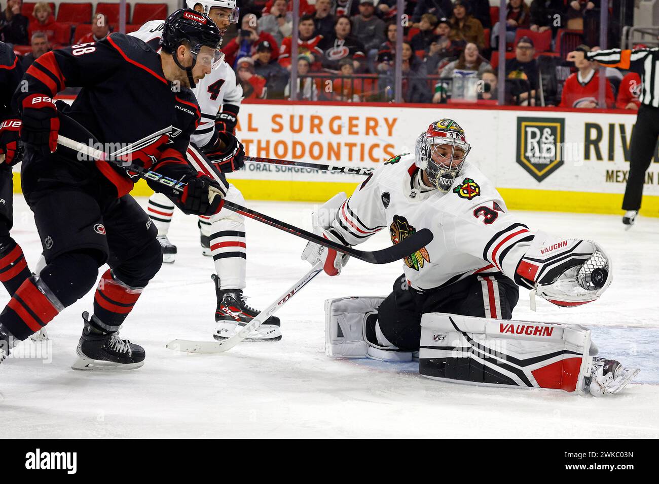 Chicago Blackhawks goaltender Petr Mrazek snares a shot of Carolina ...