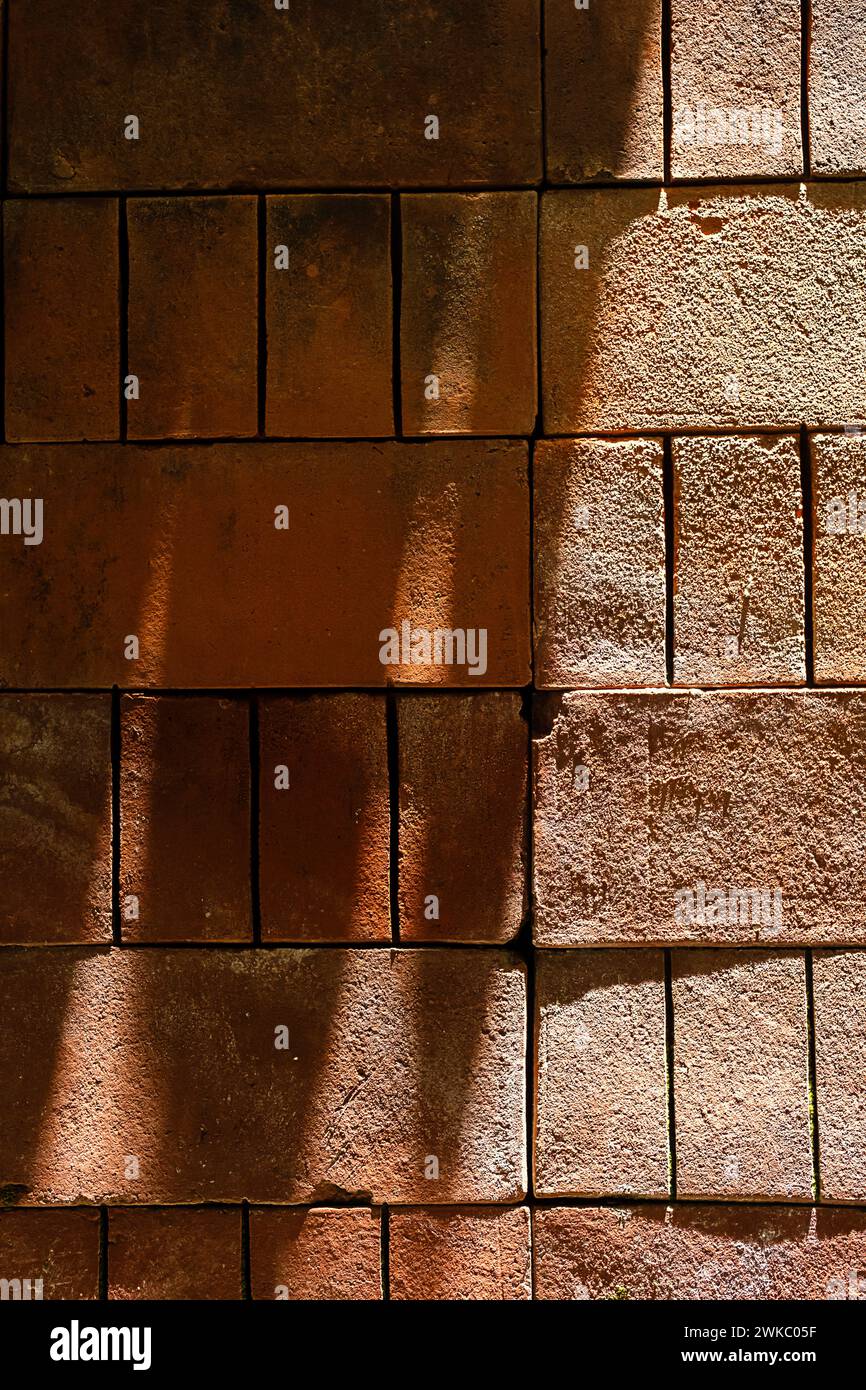 Patterns made from light and shadows on brick wall Stock Photo - Alamy