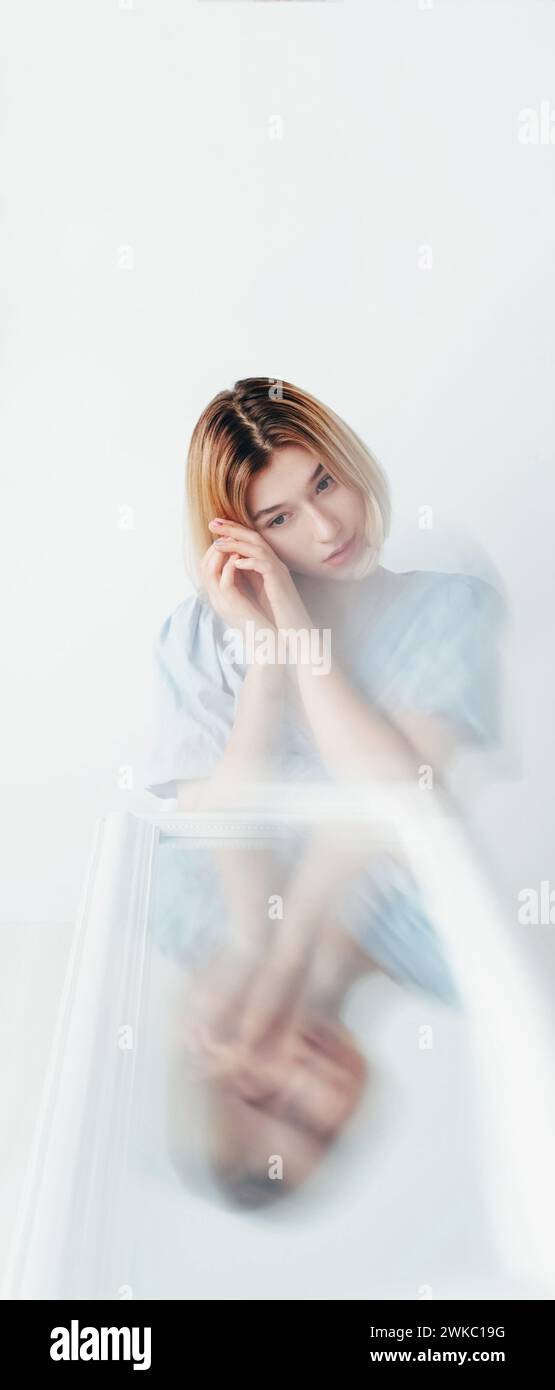Emotional disorder woman blur mirror reflection Stock Photo - Alamy