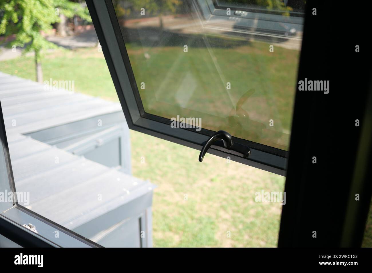 open vintage glass window black frame Stock Photo - Alamy