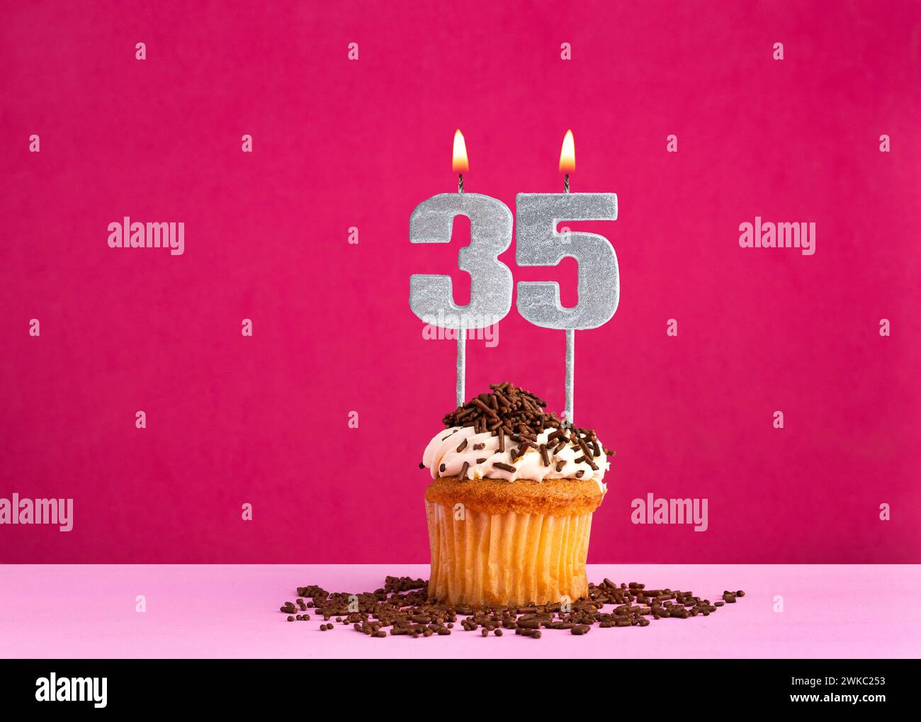 Birthday cupcake with candle number 35 - Birthday card on pink ...