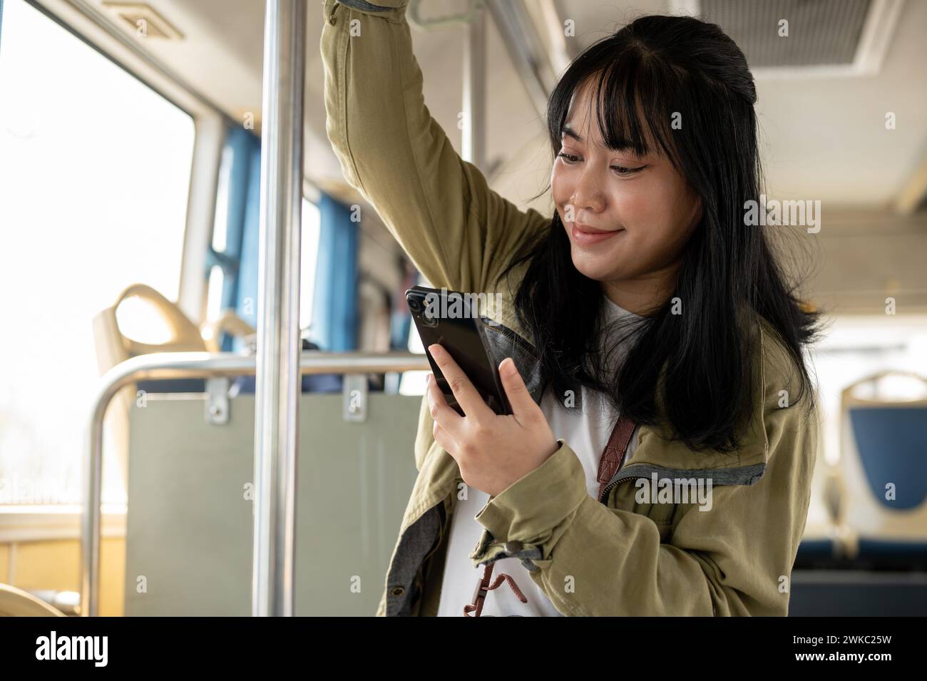 Asian female passenger using hi-res stock photography and images - Alamy