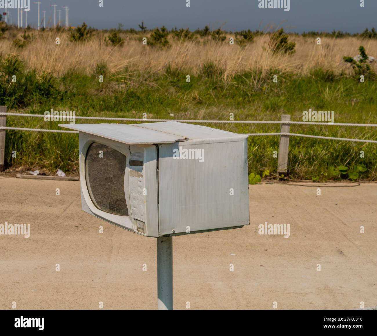 Small microwave oven on metal pole used as mailbox in South Korea Stock ...