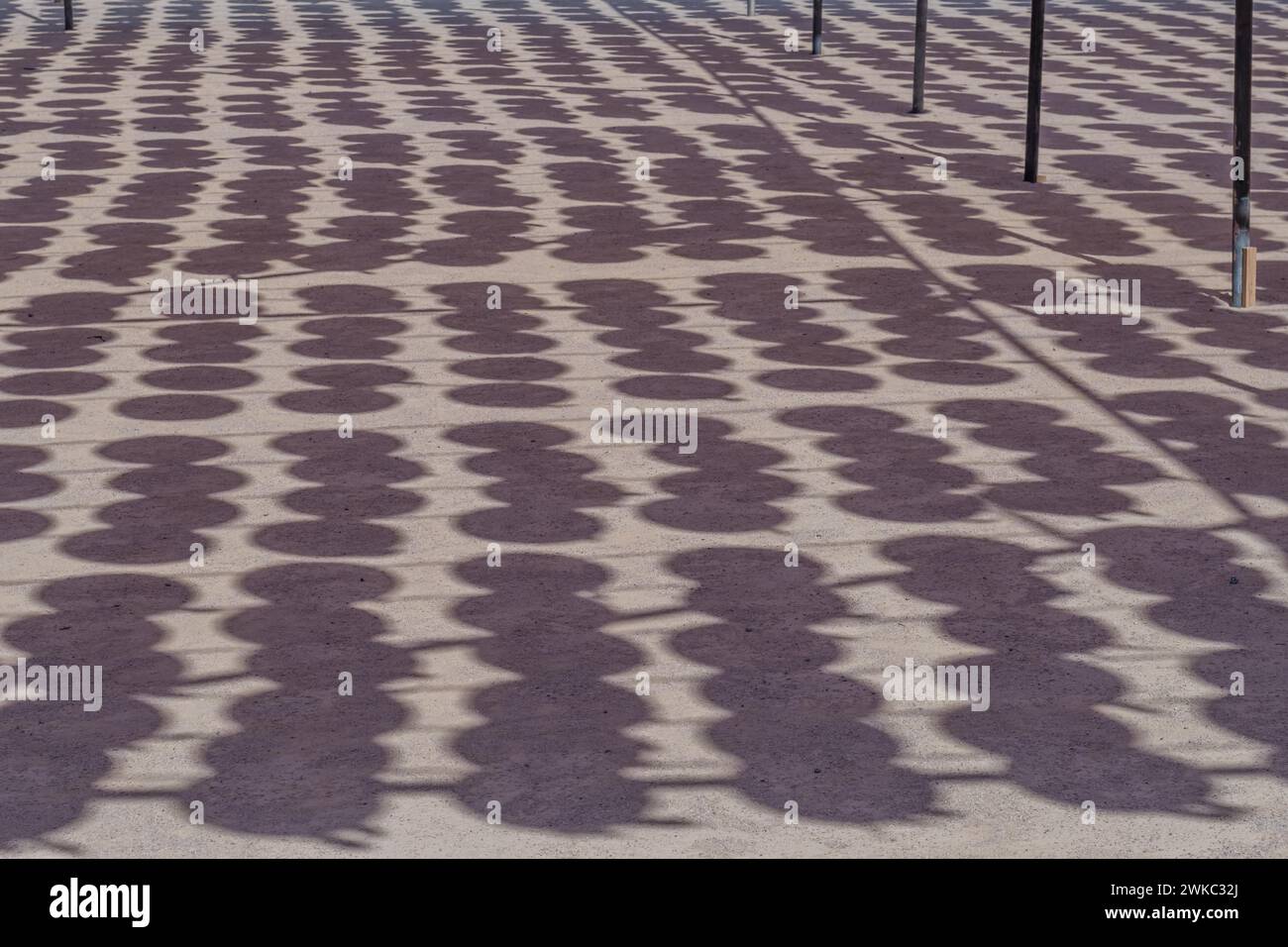 Shadows of oriental paper lanterns hanging from wires at Buddhist ...