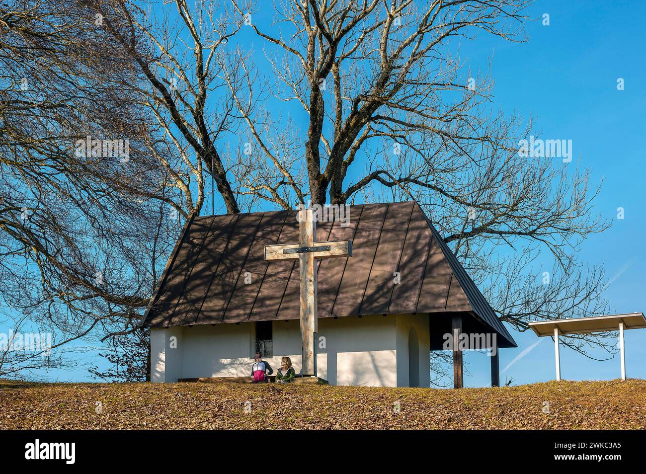 Chapel and wooden cross on the Buchenberg, Buchenberg, Allgaeu, Bavaria ...