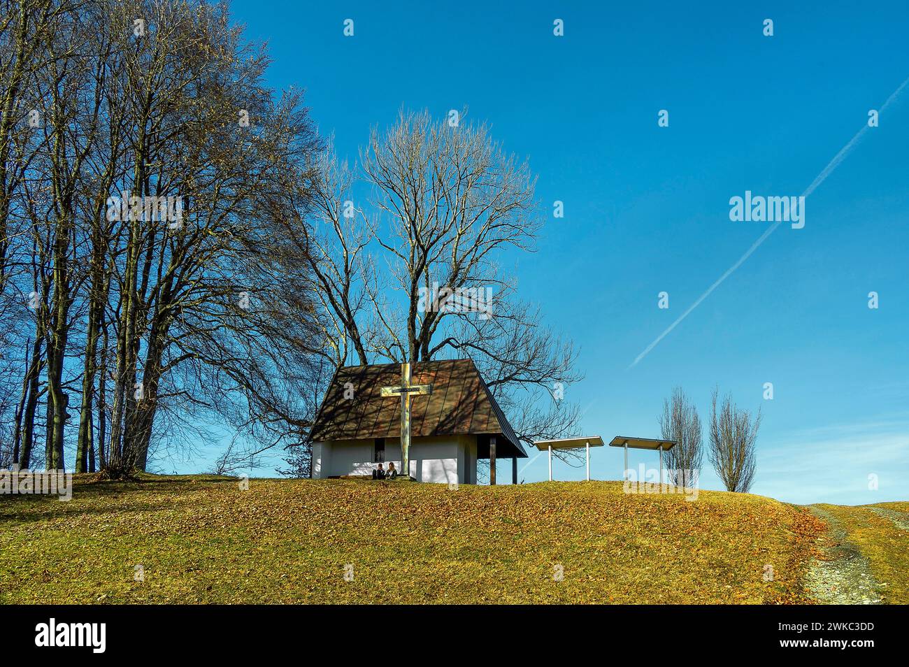 Chapel and wooden cross on the Buchenberg, Buchenberg, Allgaeu, Bavaria ...