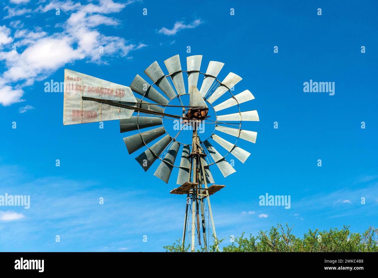 Wind turbine for pumping water, Namibia Stock Photo - Alamy