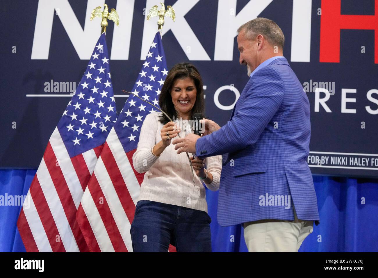 Republican South Carolina Rep. Chris Wooten, right, hands a switch to ...