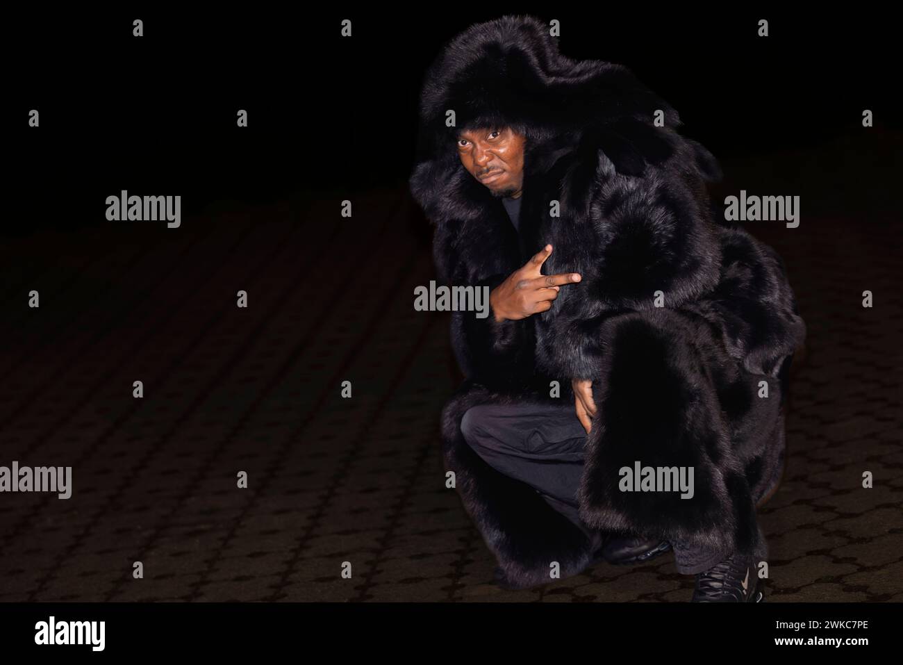 Dizzee Rascal poses for photographers upon arrival at the Burberry ...