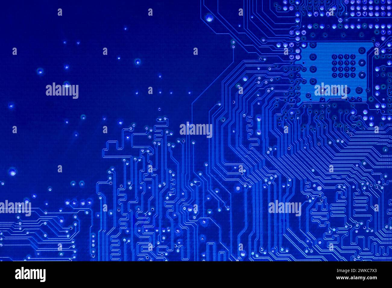 blue printed motherboard. computer electronic circuit board. closeup view Stock Photo - Alamy
