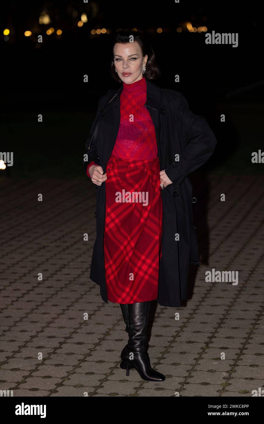 Debi Mazar poses for photographers upon arrival at the Burberry Winter ...