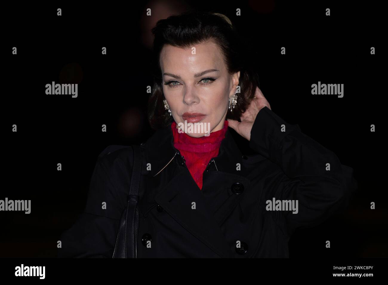 Debi Mazar poses for photographers upon arrival at the Burberry Winter ...
