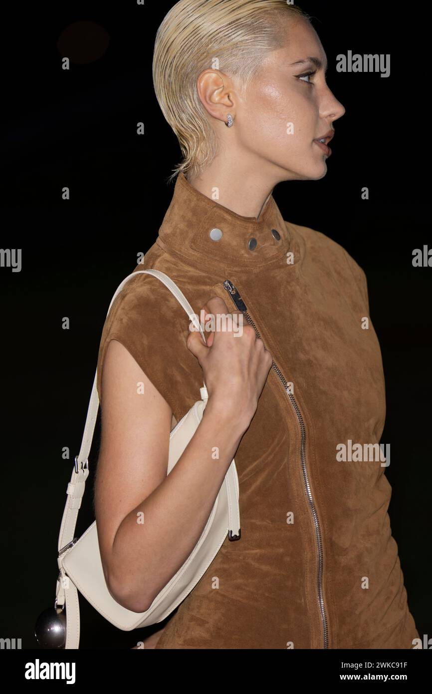 Iris Law poses for photographers upon arrival at the Burberry Winter ...