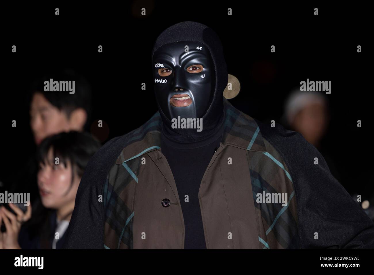 M Huncho poses for photographers upon arrival at the Burberry Winter ...