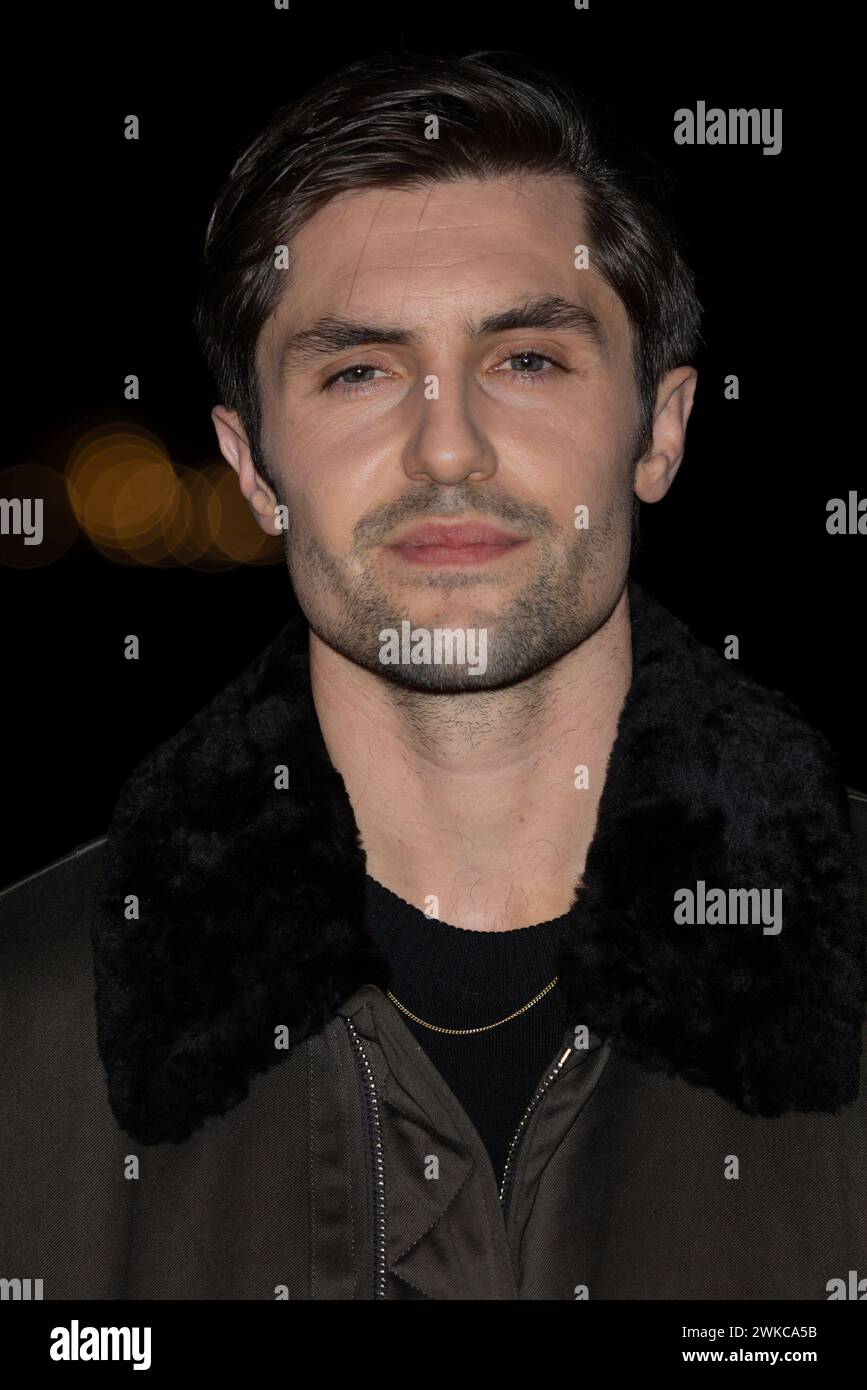 Phil Dunster poses for photographers upon arrival at the Burberry ...